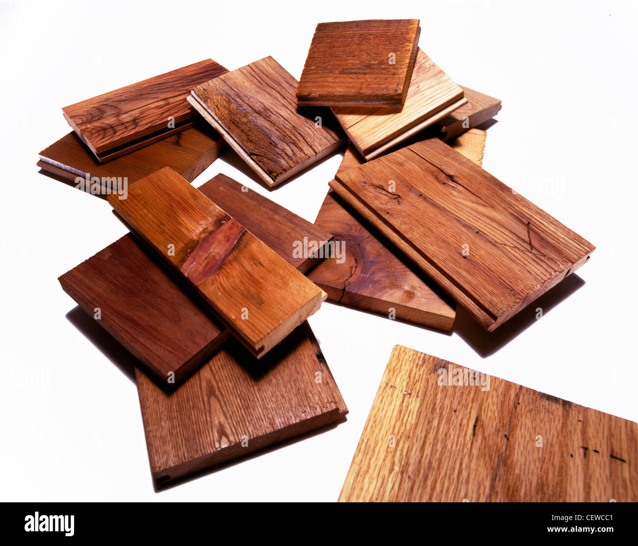 A collection of assorted blocks of wood on a white background Stock ...