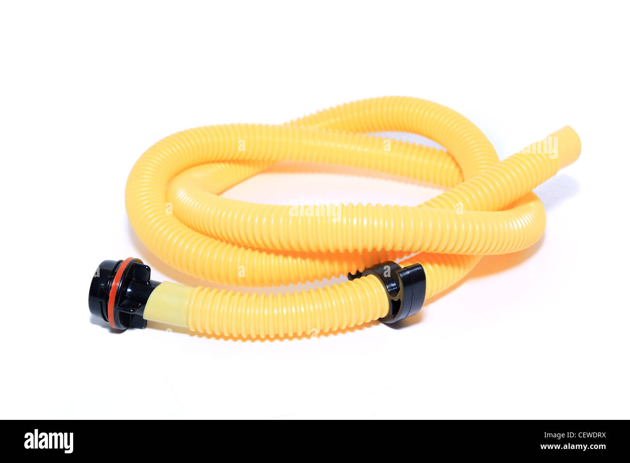 yellow hose on white background Stock Photo - Alamy
