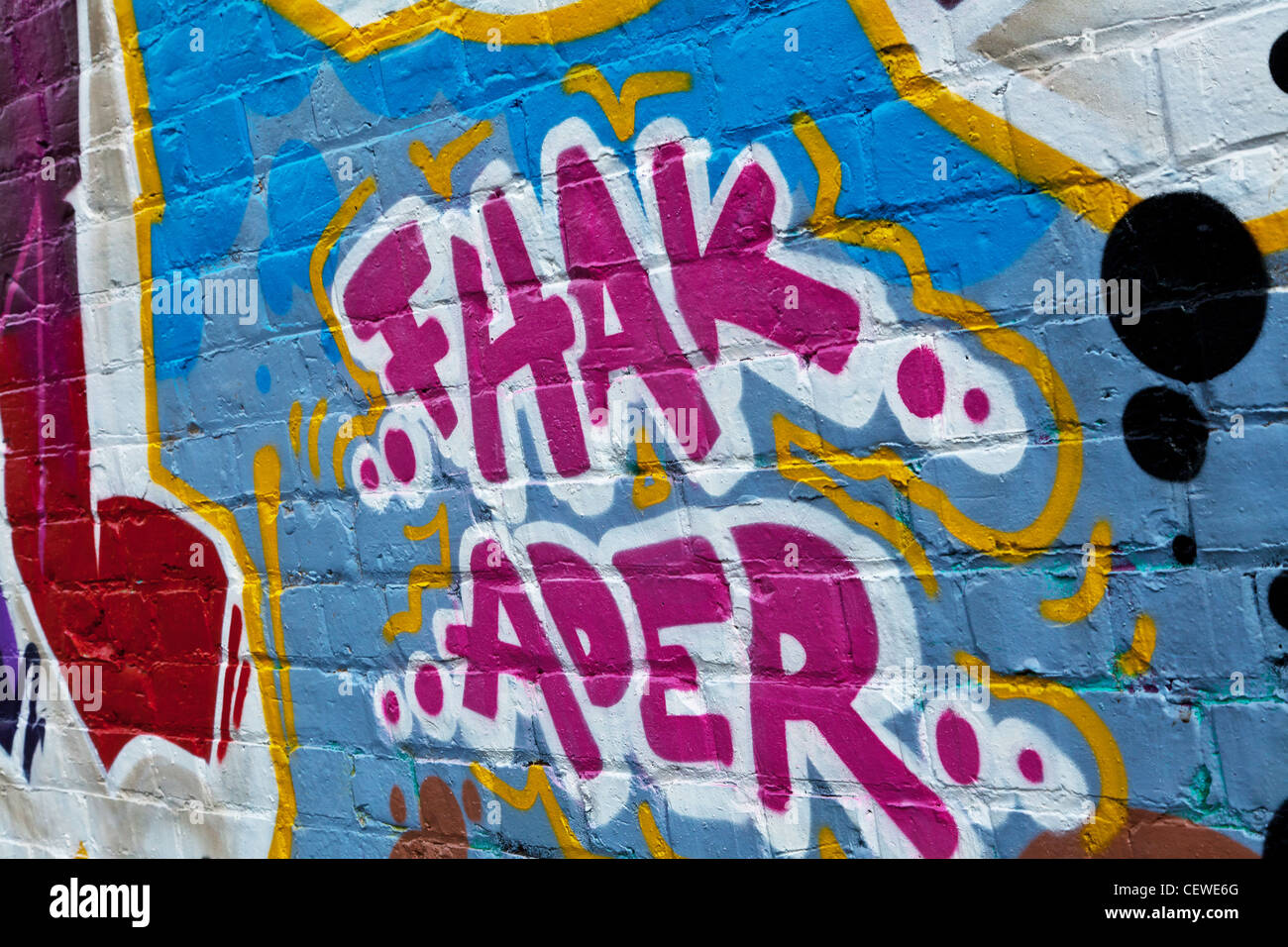 FHAK ADER, graffiti text on brick wall Stock Photo - Alamy