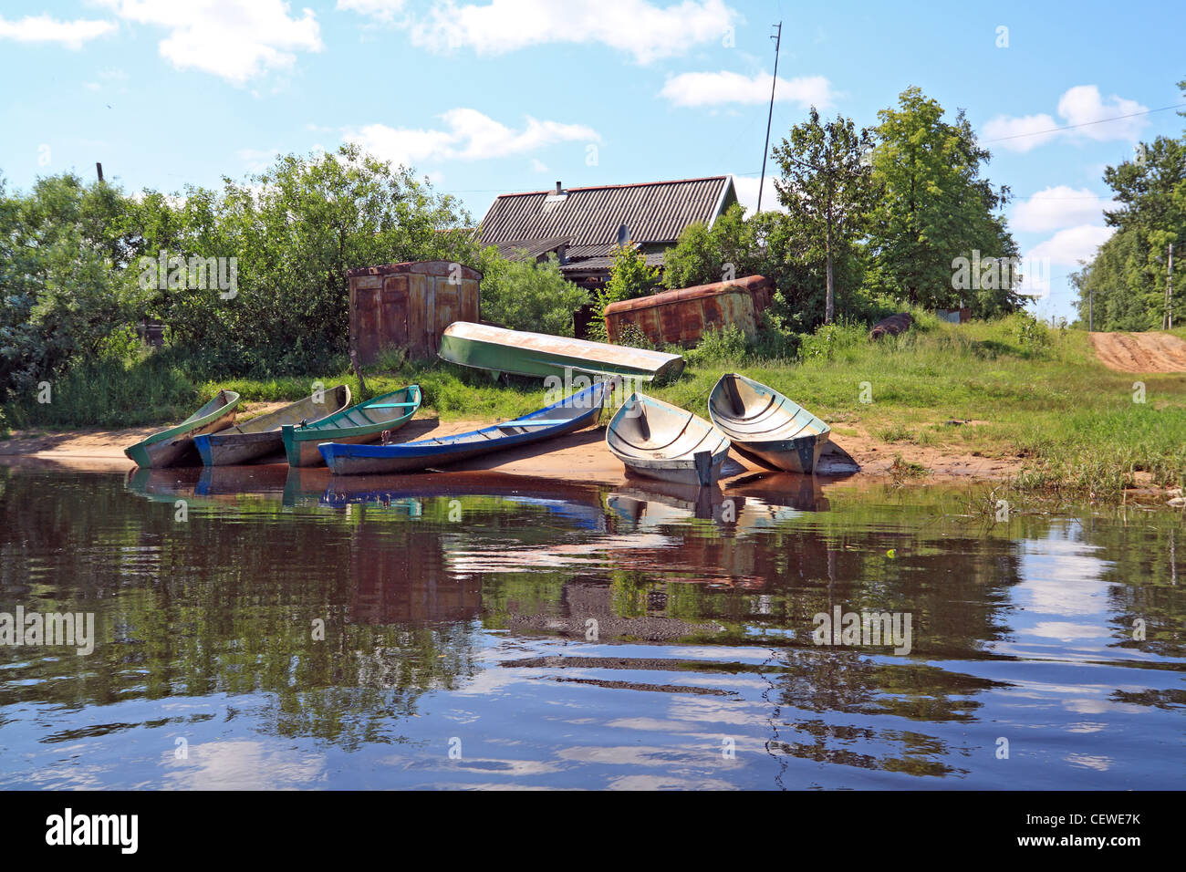 rural boats on coast river Stock Photo - Alamy