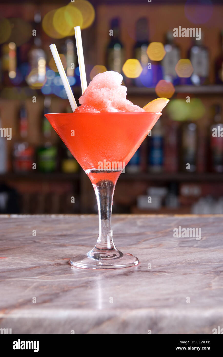 red frozen cocktail on the wooden bar Stock Photo - Alamy