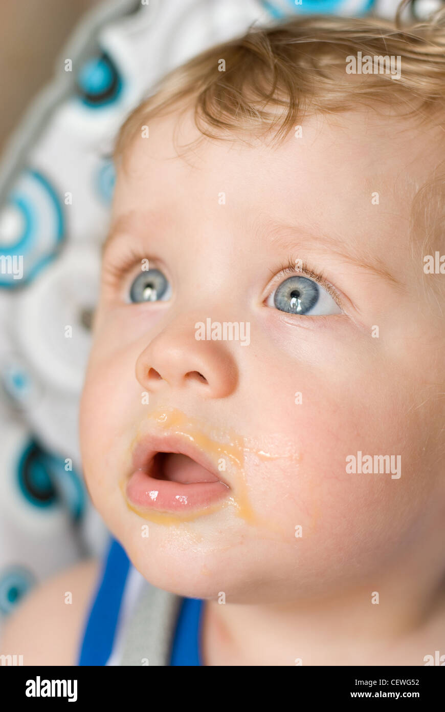 Baby boy eating oatmeal hi-res stock photography and images - Alamy