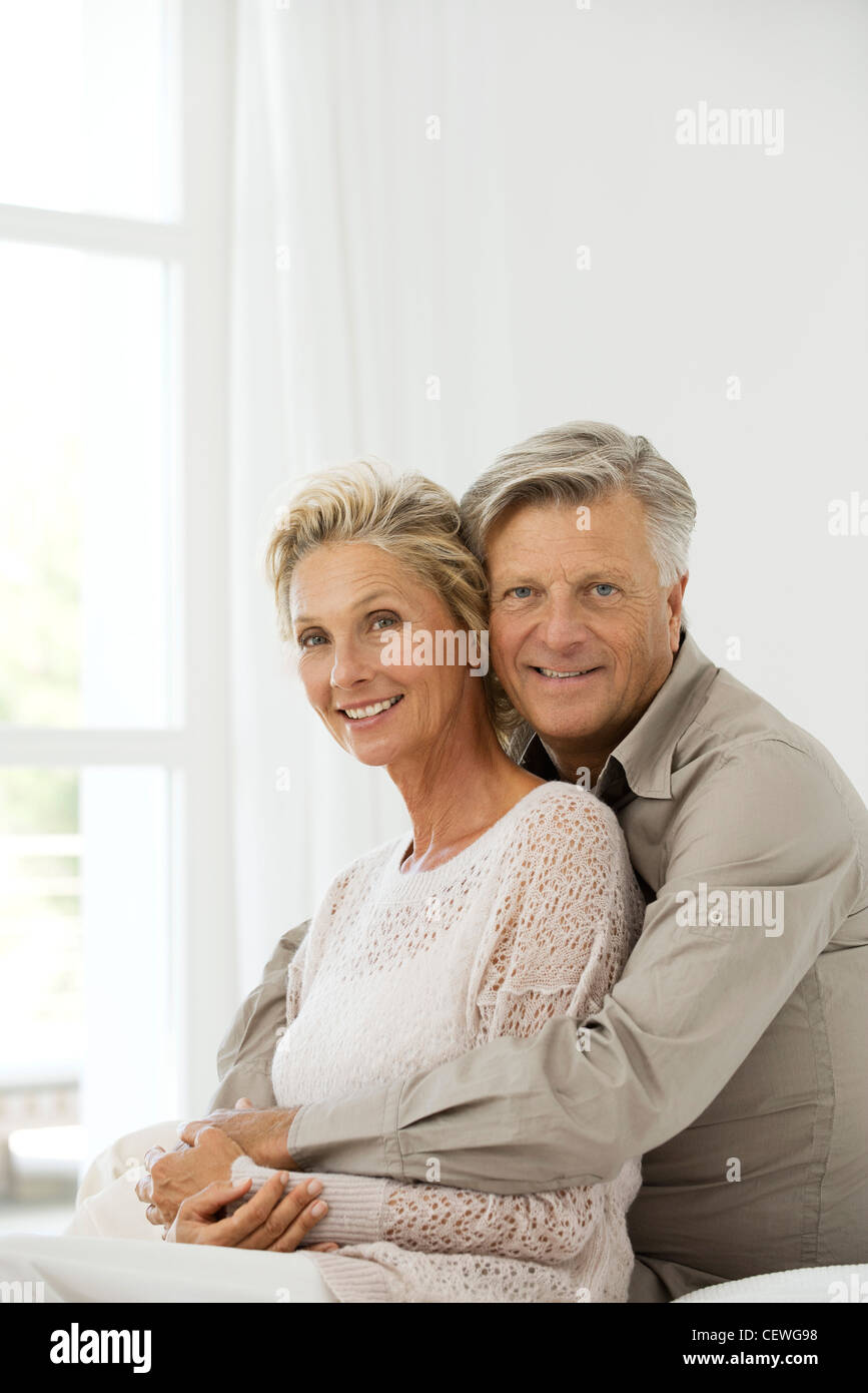 Mature couple embracing, portrait Stock Photo - Alamy