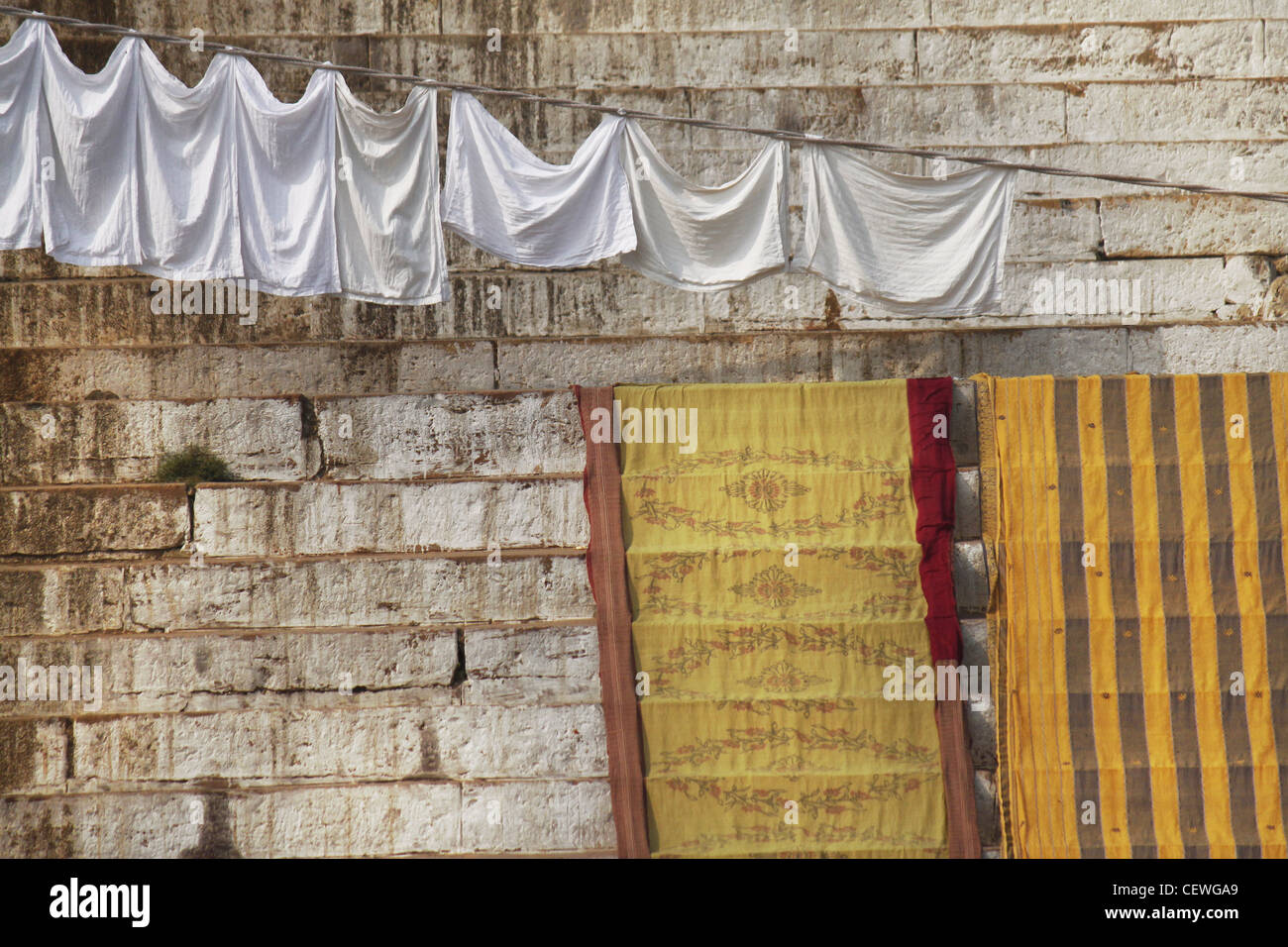 Clothes drying in benaras ghats, india Stock Photo - Alamy