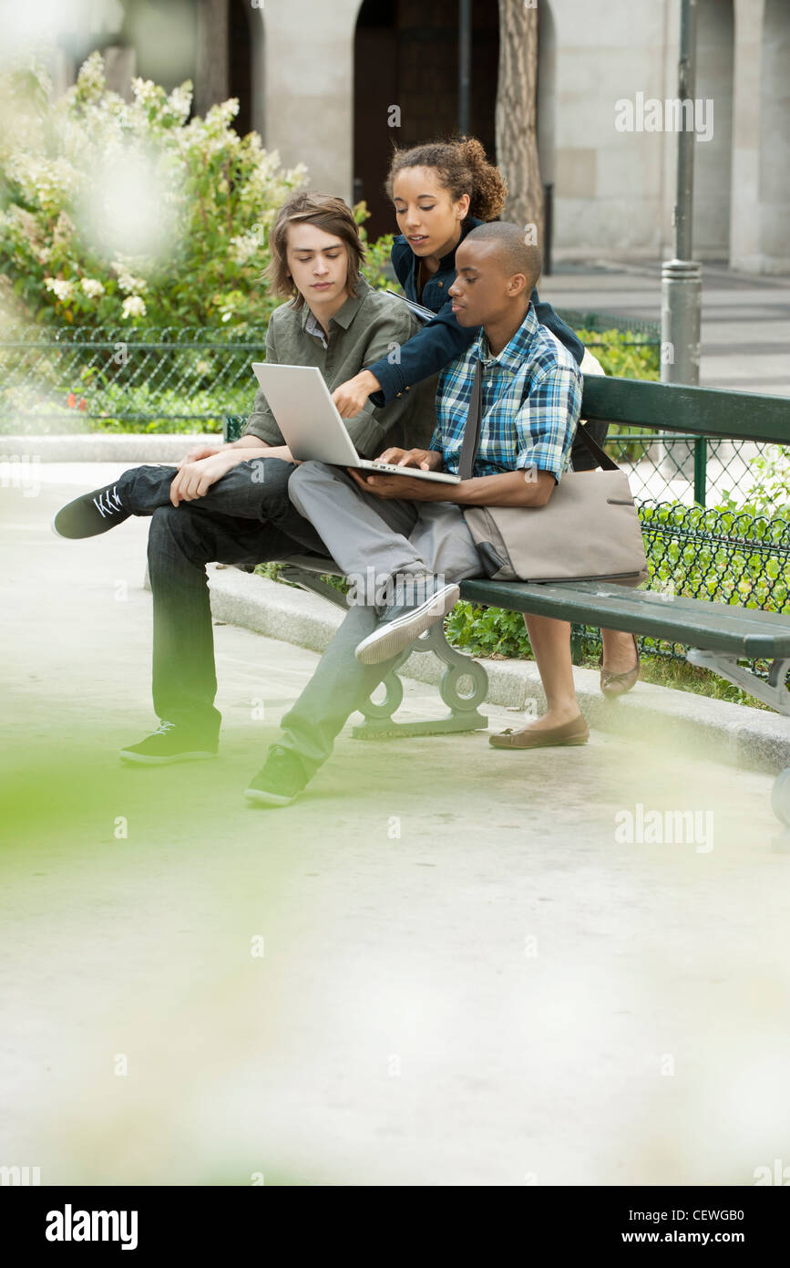 University students studying on campus with laptop computer Stock Photo ...