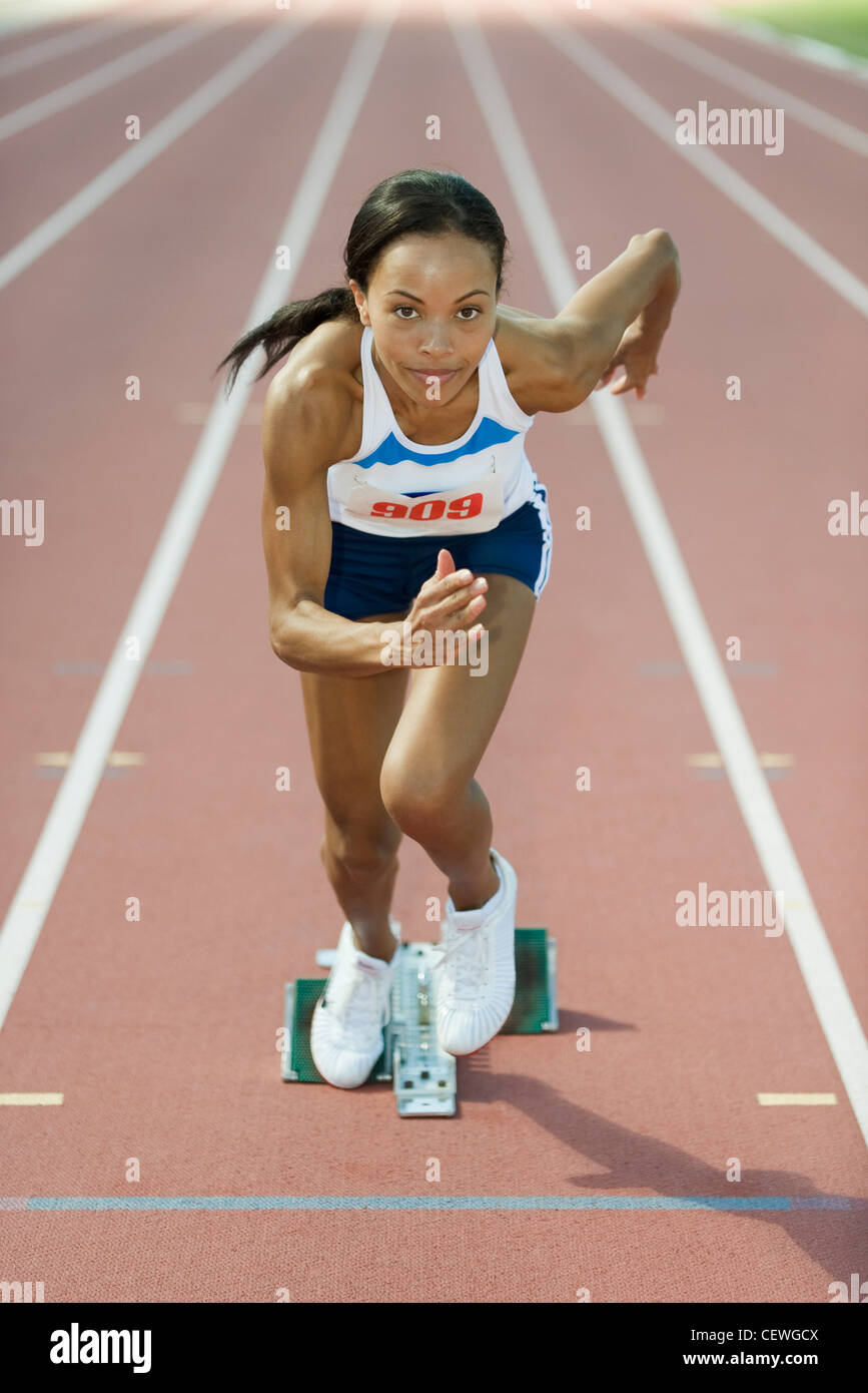 Runner at starting line Stock Photo - Alamy