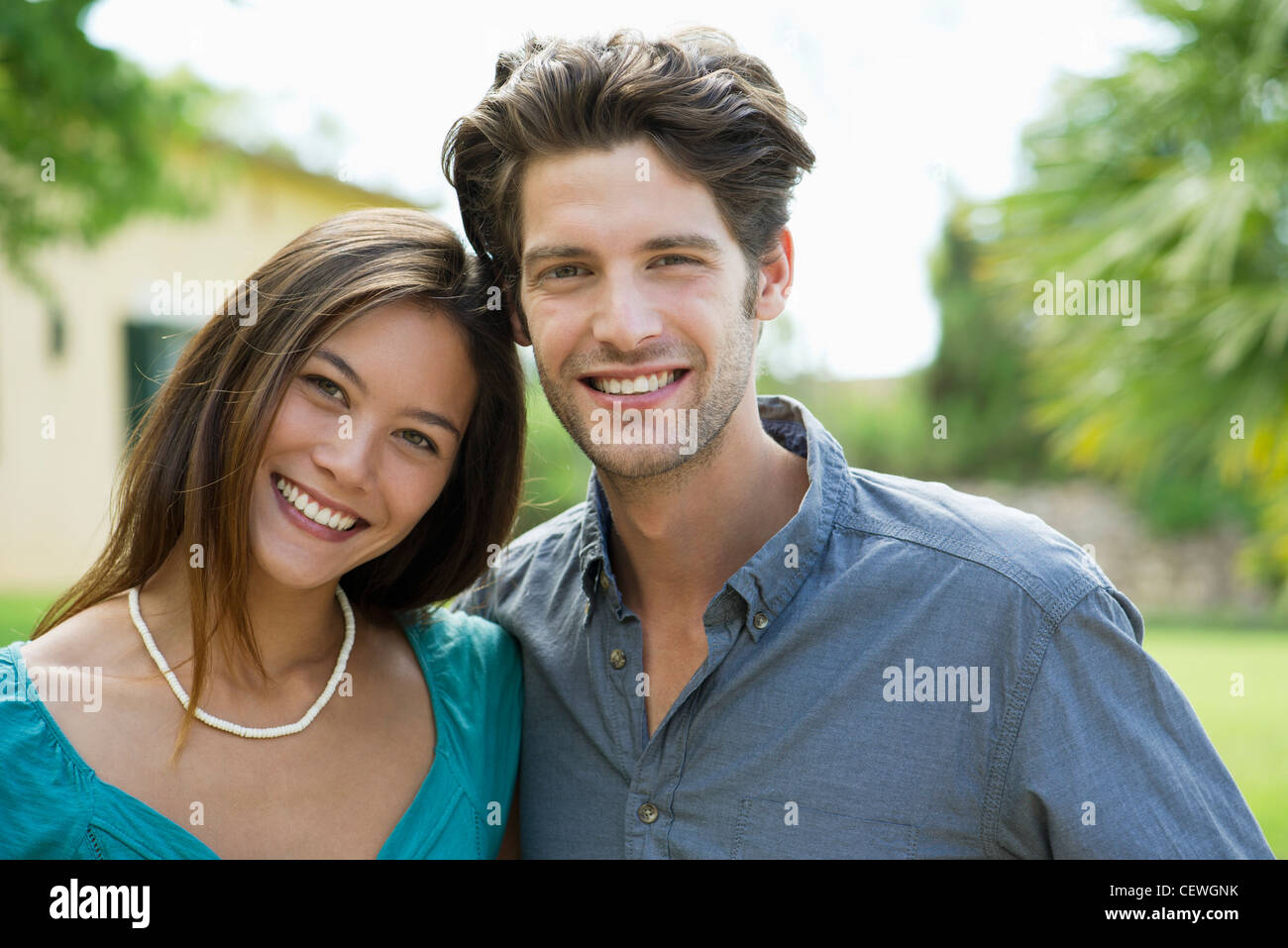 Happy young couple, portrait Stock Photo - Alamy