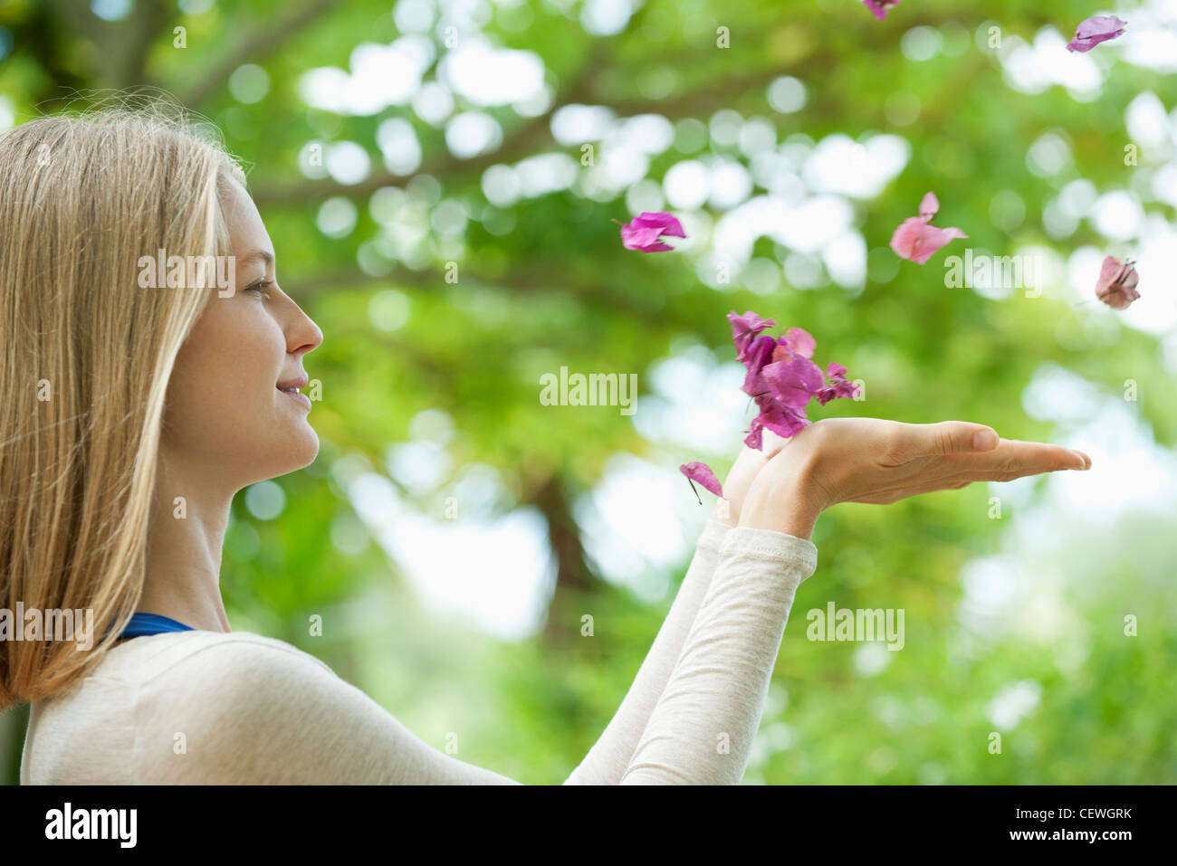 Young happy blonde woman catching hi-res stock photography and images ...
