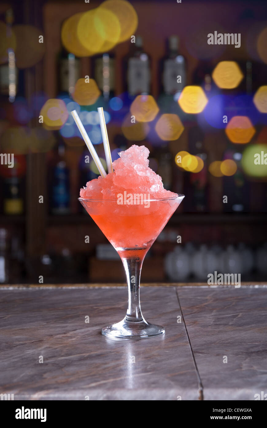 red frozen cocktail on the wooden bar Stock Photo - Alamy
