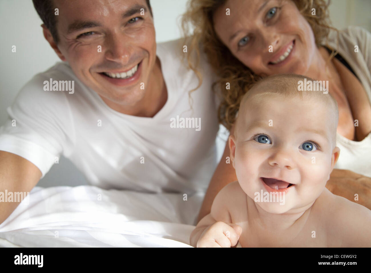 Parents with baby, portrait Stock Photo - Alamy