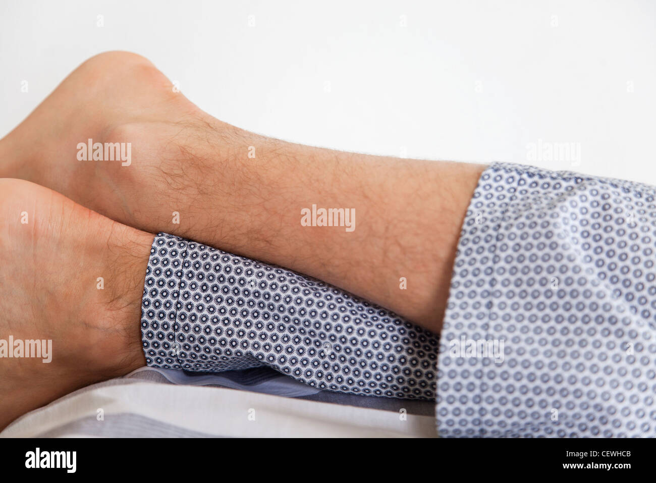 Ankles crossed hi-res stock photography and images - Alamy
