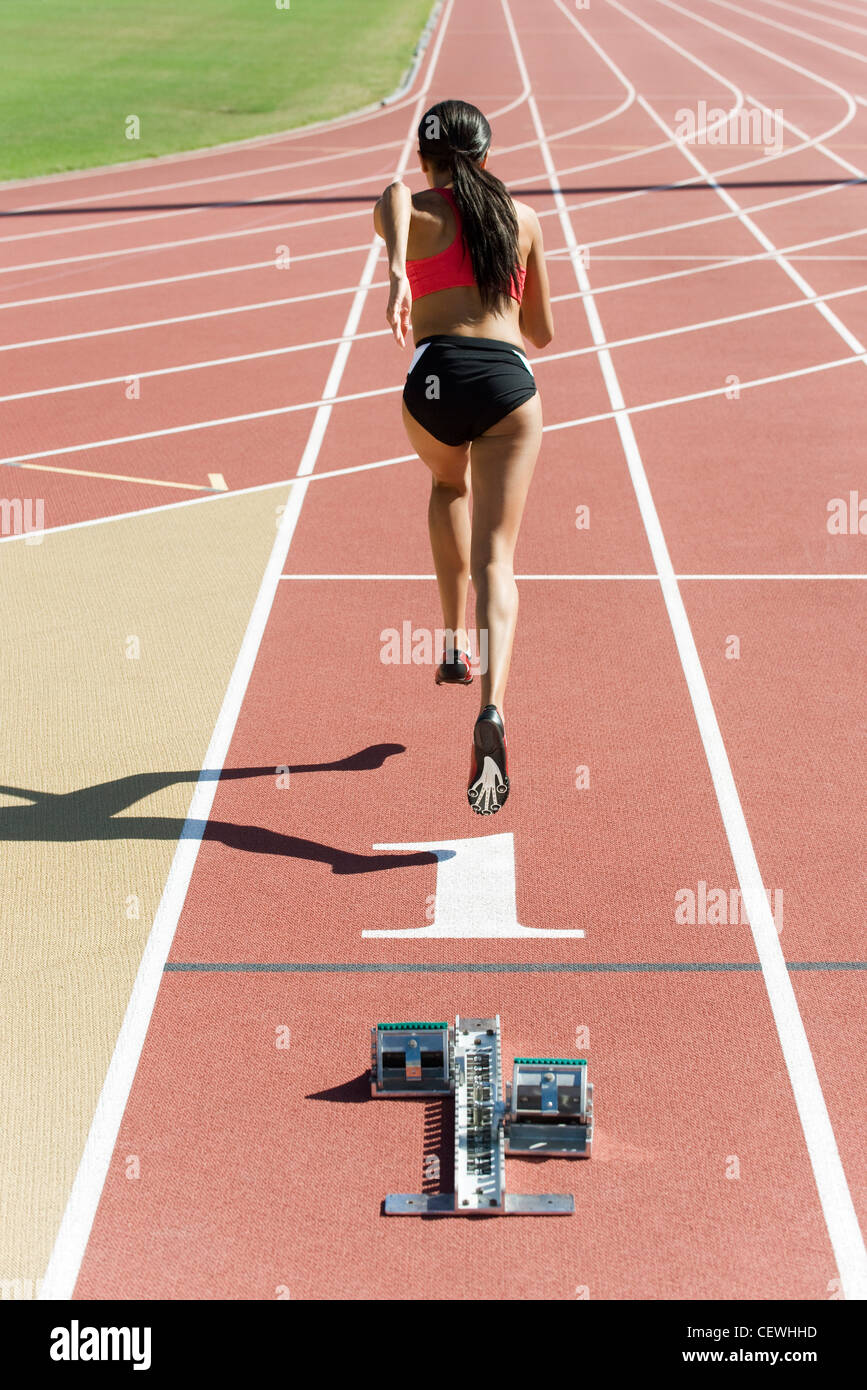 Woman Running On Track