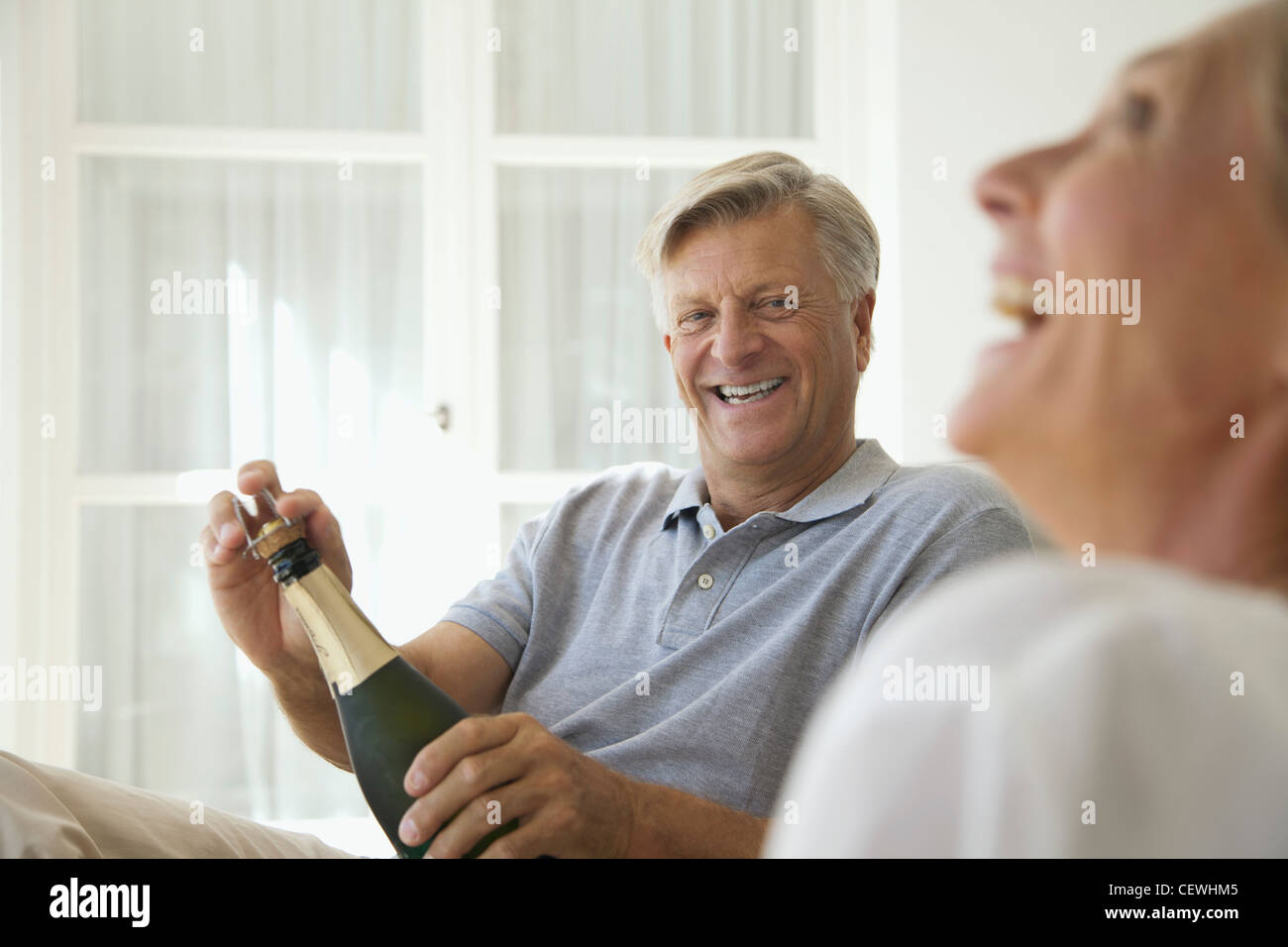 Couple enjoys relaxing time home hi-res stock photography and images ...