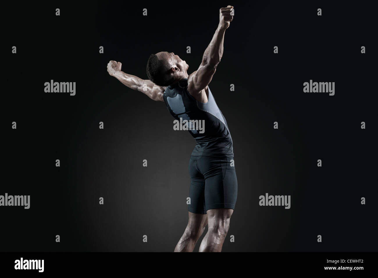 Male athlete shouting in celebratory way Stock Photo - Alamy