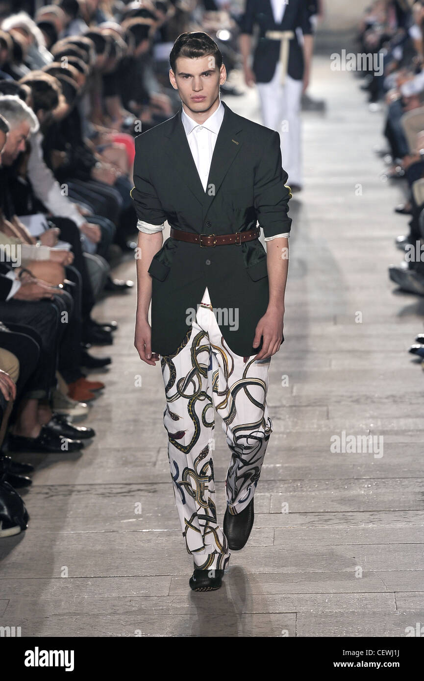 Raf Simons Paris Ready to Wear Spring Summer Male model wearing a grey ...