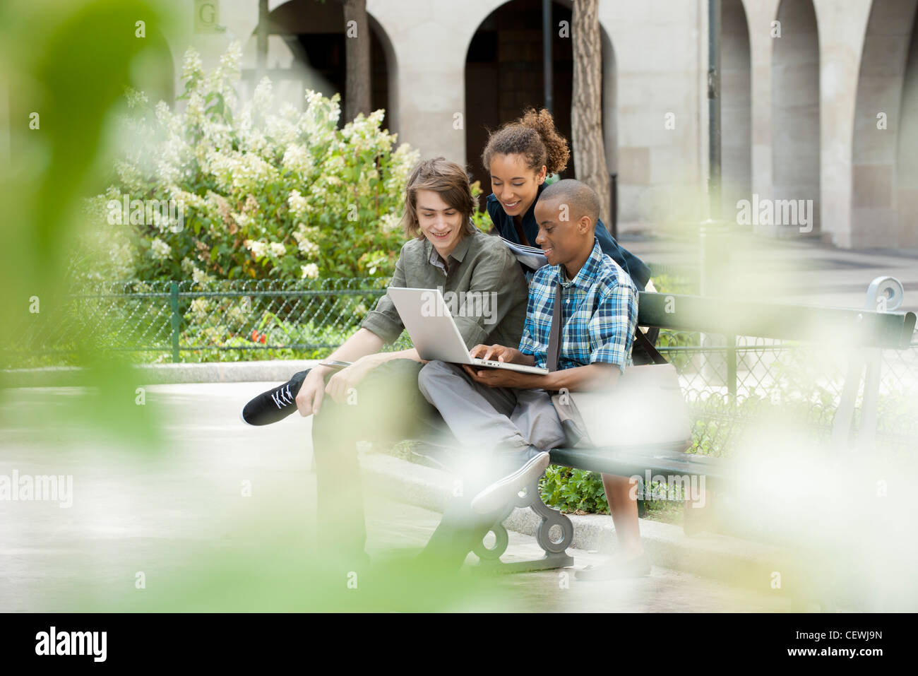 University students using laptop computer on campus Stock Photo - Alamy