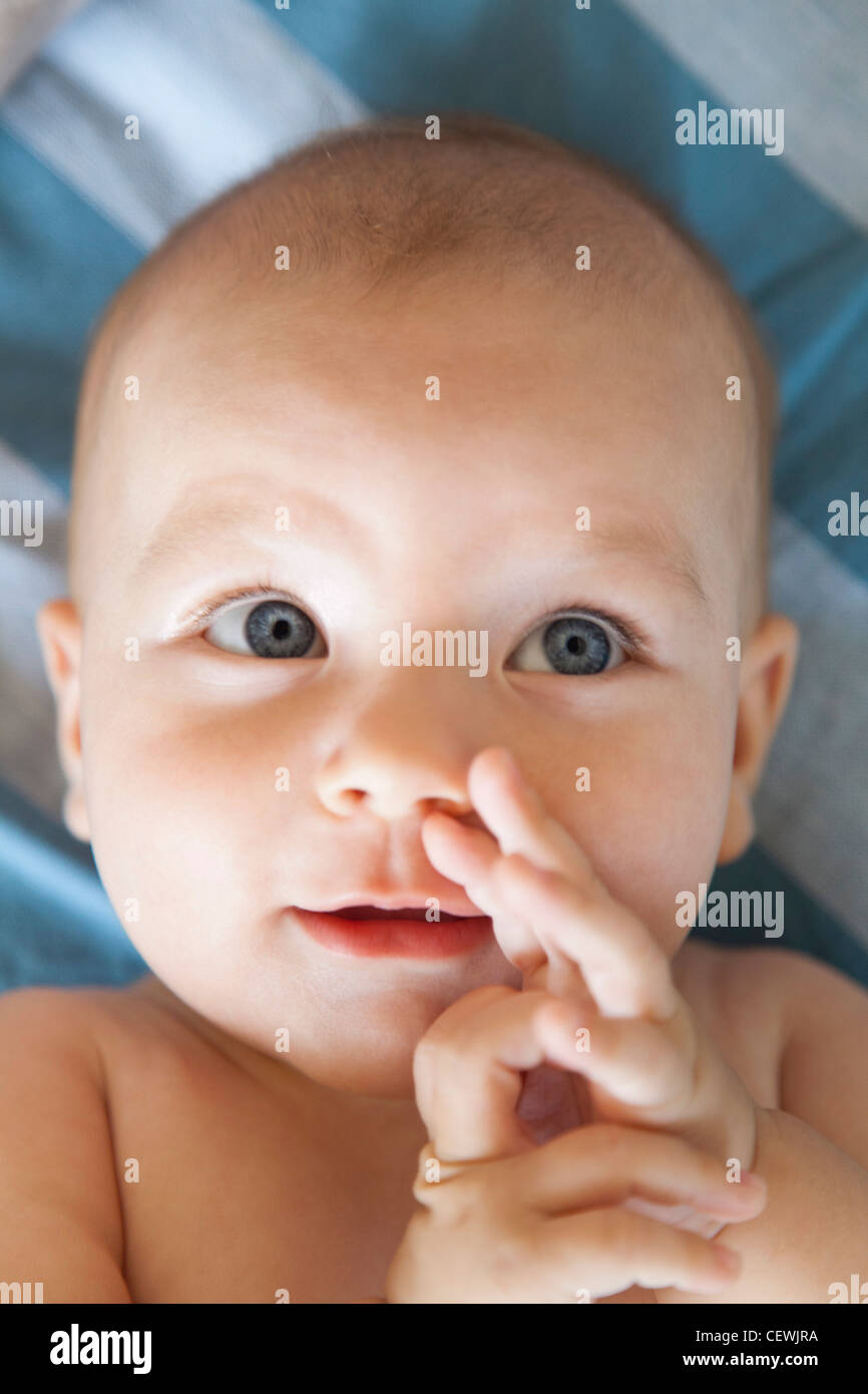 Baby looking up, portrait Stock Photo - Alamy
