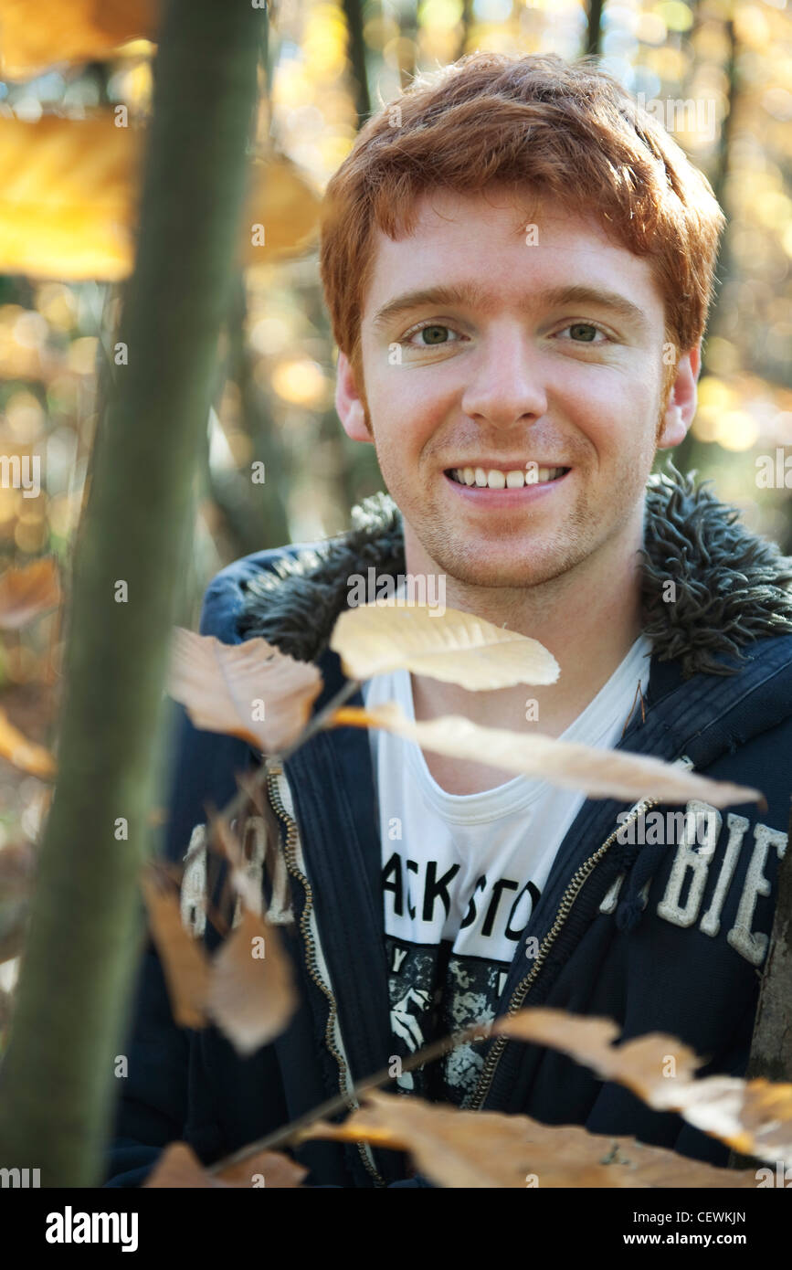 Young man in nature Stock Photo - Alamy