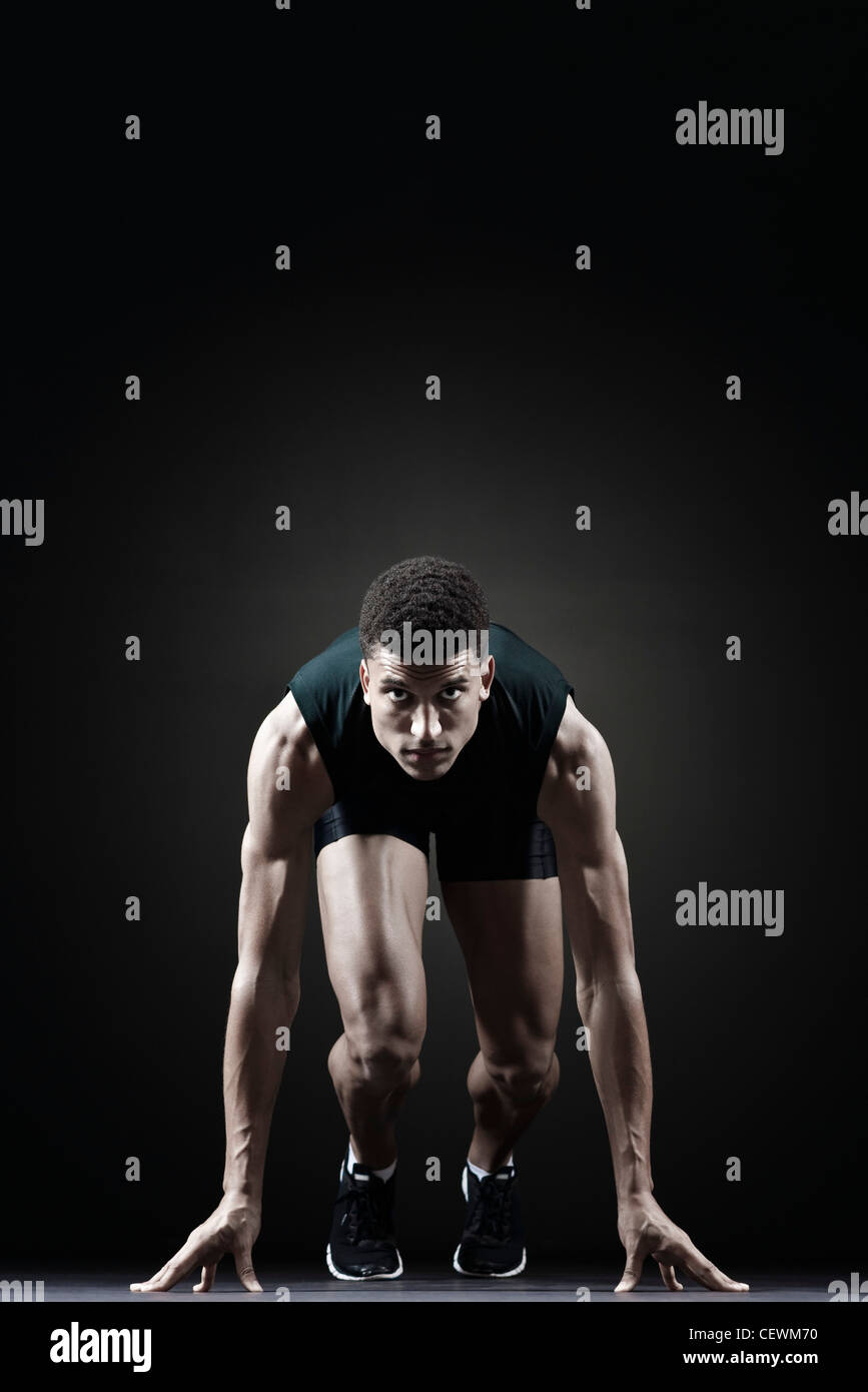 Runner at starting line Stock Photo - Alamy