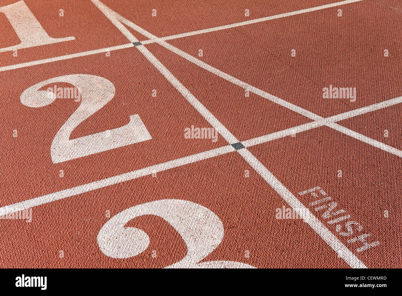Lanes of running track, focus on lane two Stock Photo - Alamy