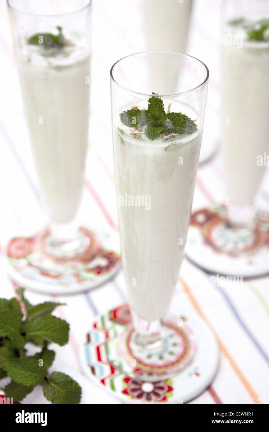 Indian yoghurt drink mint leaves on top hi-res stock photography and ...