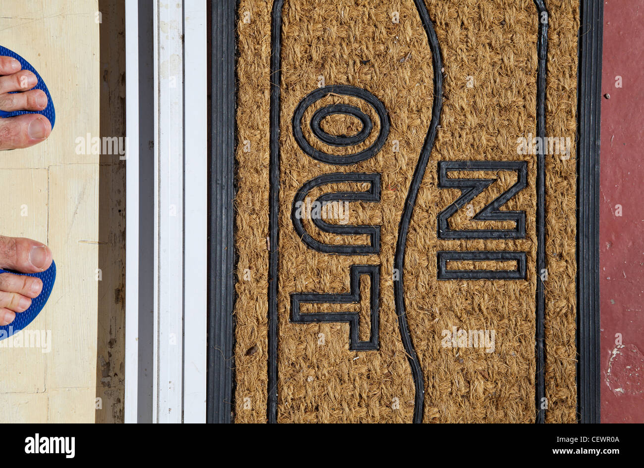 In And Out Welcome Mat Stock Photo - Alamy