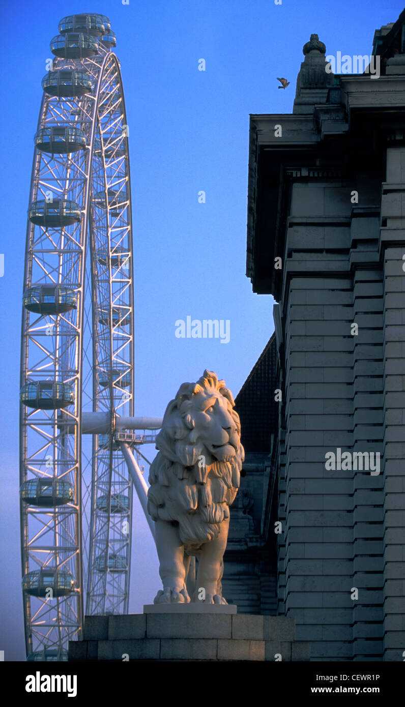 The London Eye at sunrise, with Coade Lion statue Stock Photo - Alamy
