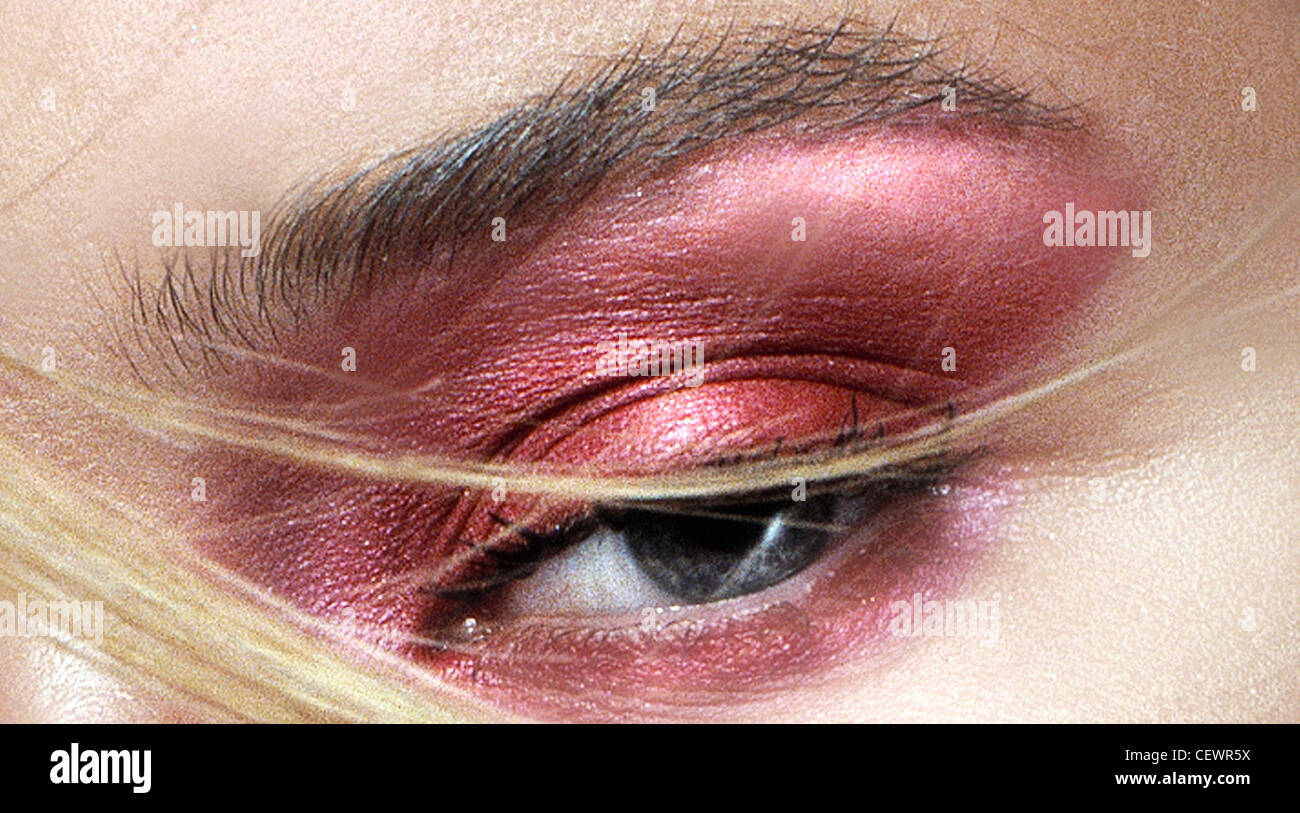 Female with blonde hair wearing red metallic eyeshadow Stock Photo - Alamy