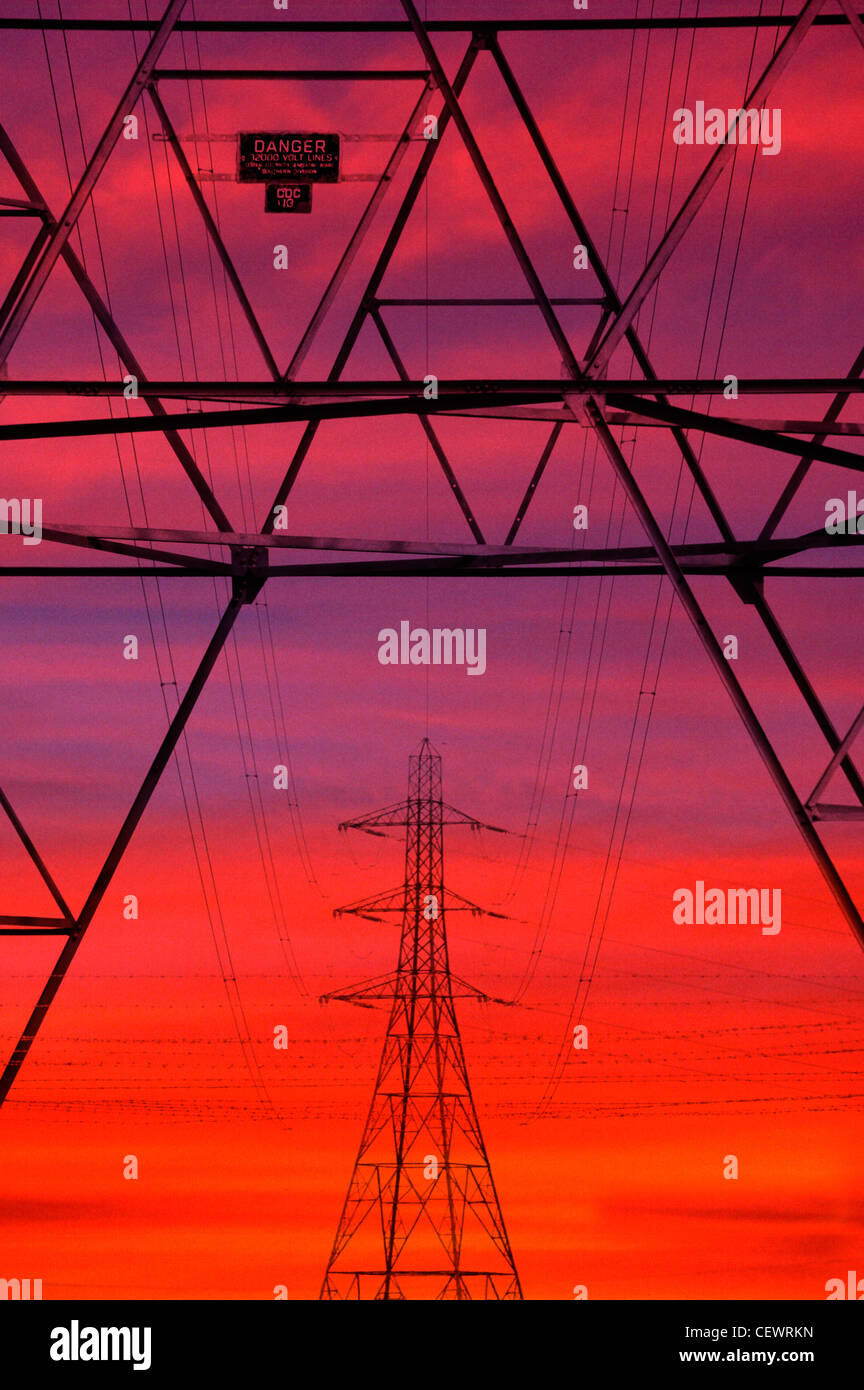 Pylons, red dusk in Radley Stock Photo - Alamy