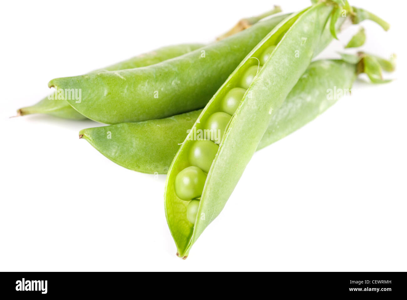 Ripe pea vegetable with green leaf isolated on white background Stock ...