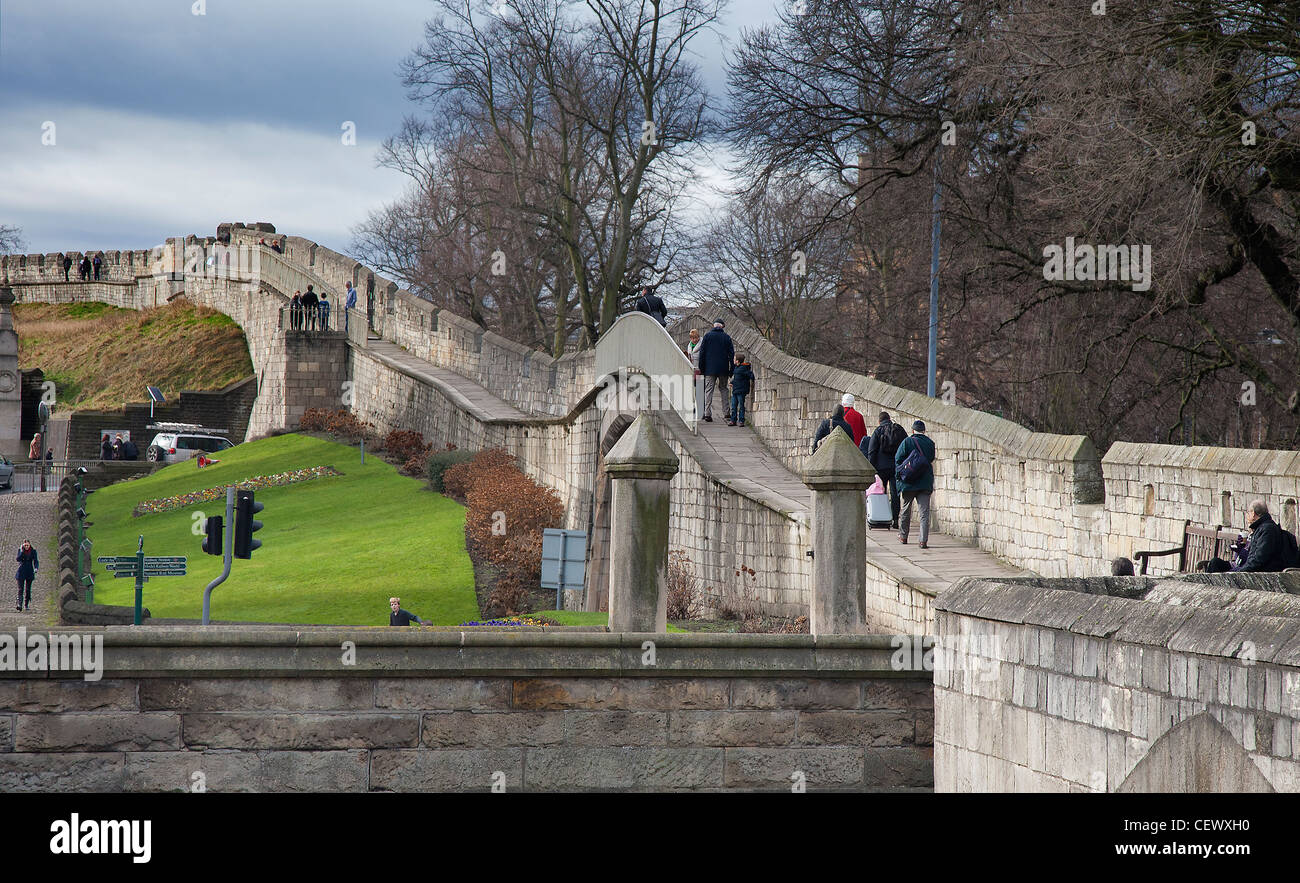 Pedestrians walking on the York City Walls, York, UK Stock Photo - Alamy
