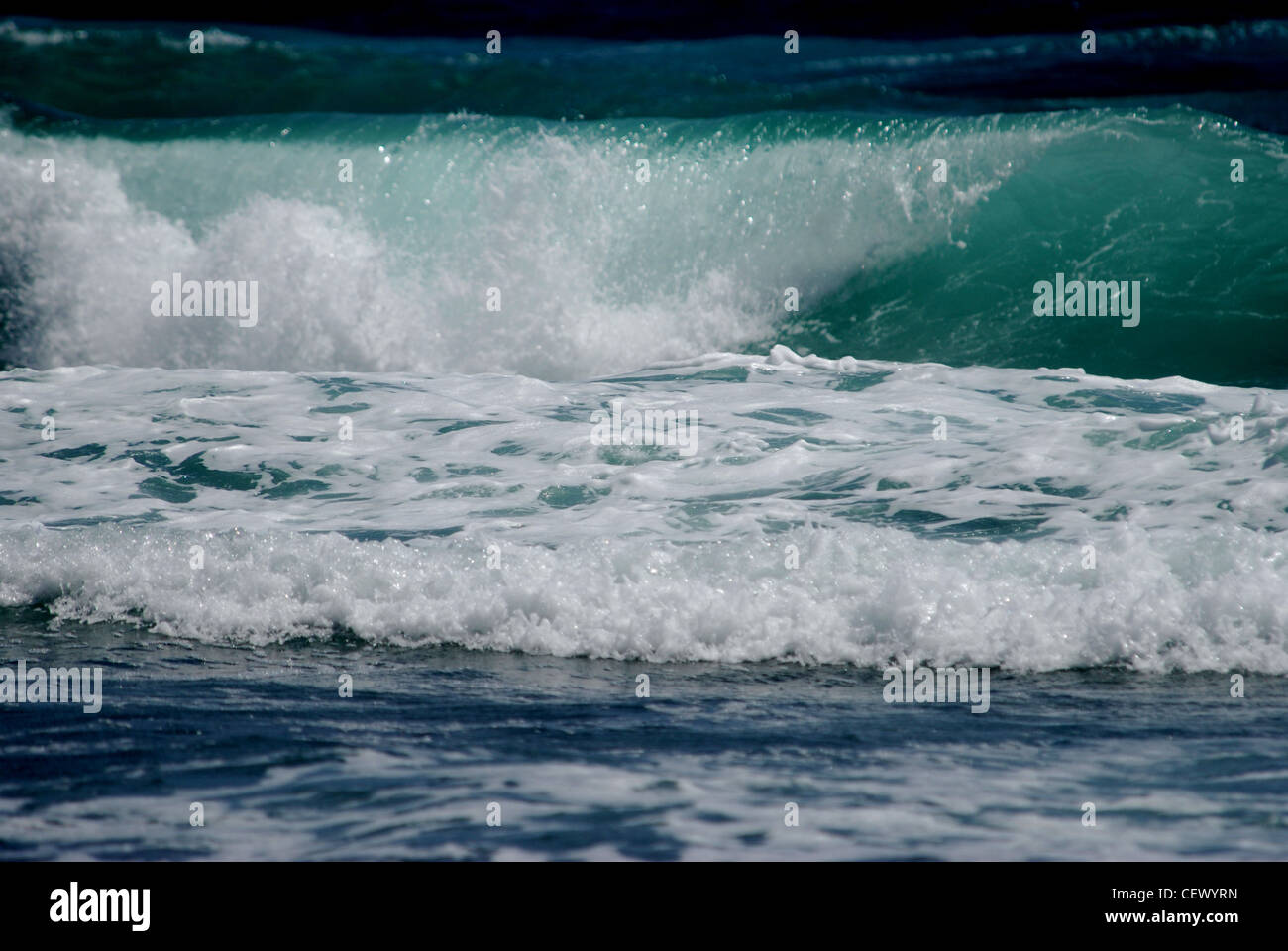 A wave rolling in from the atlantic ocean Stock Photo - Alamy