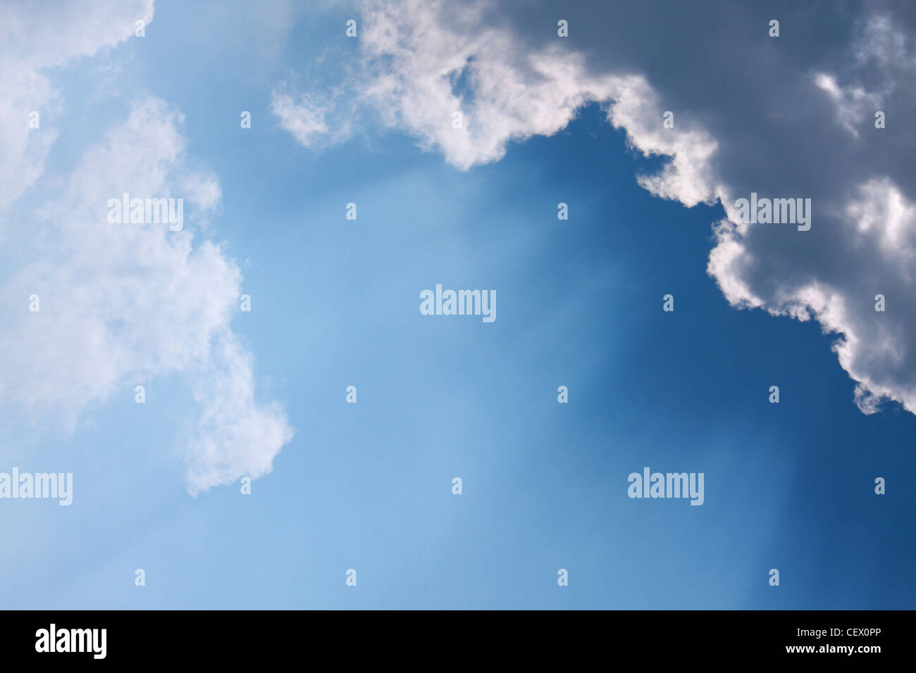 Sunbeam through the haze on blue sky Stock Photo - Alamy