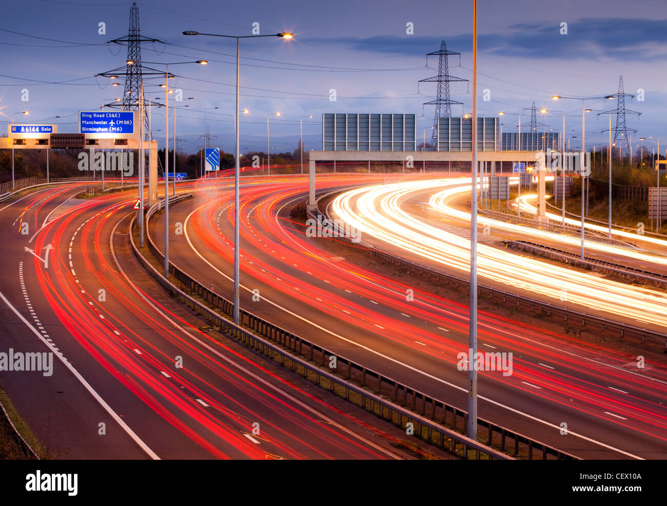 M 60 Motorway at night near Manchester with busy traffic Stock Photo ...
