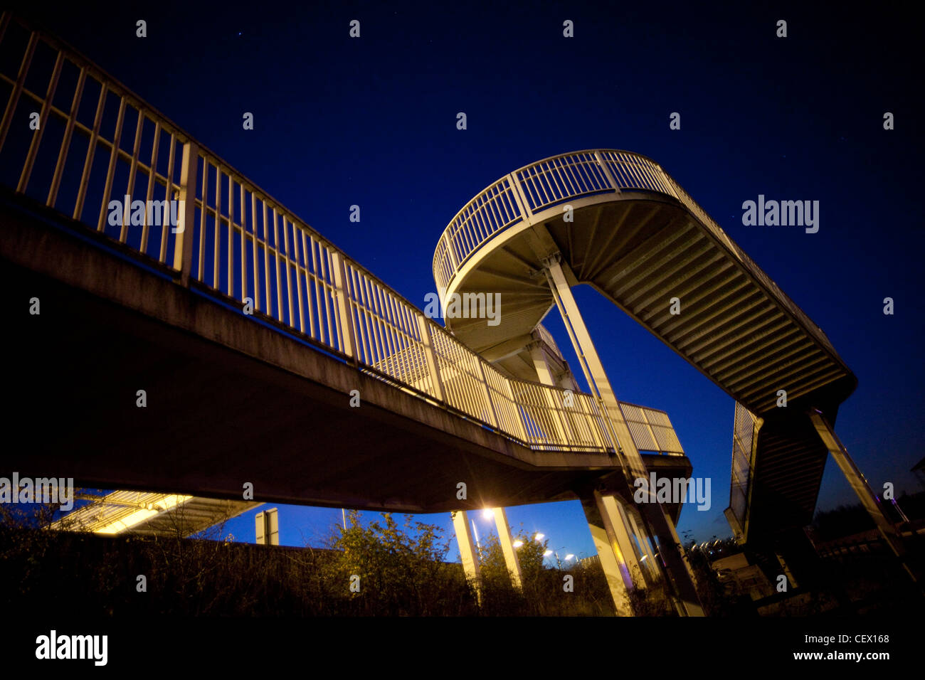 Pedestrian footbridge at night over the M60 Manchester Stock Photo - Alamy