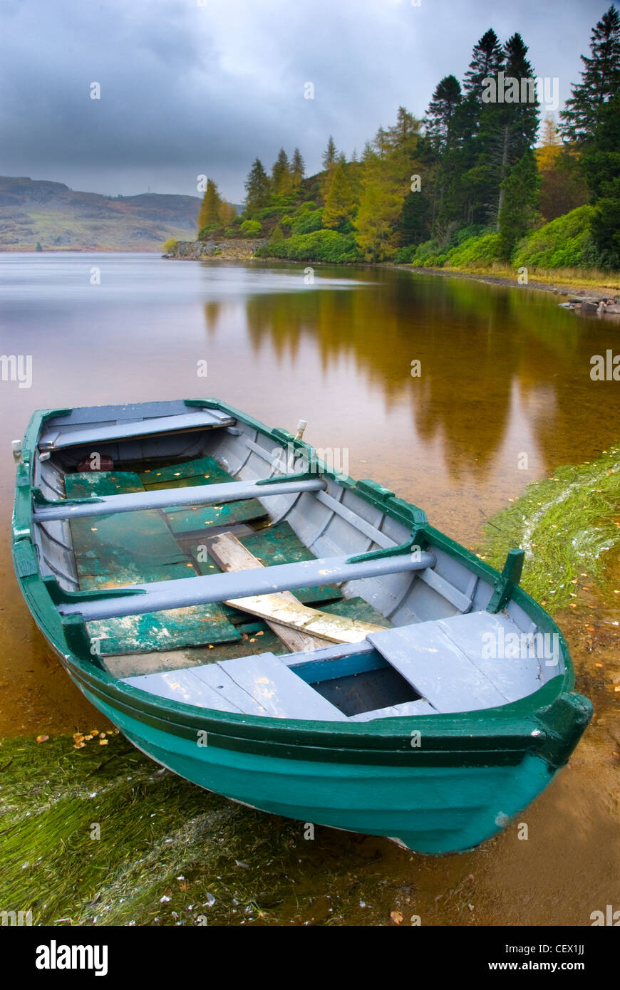 A rowing boat moored on the banks of Loch Ordie Stock Photo - Alamy