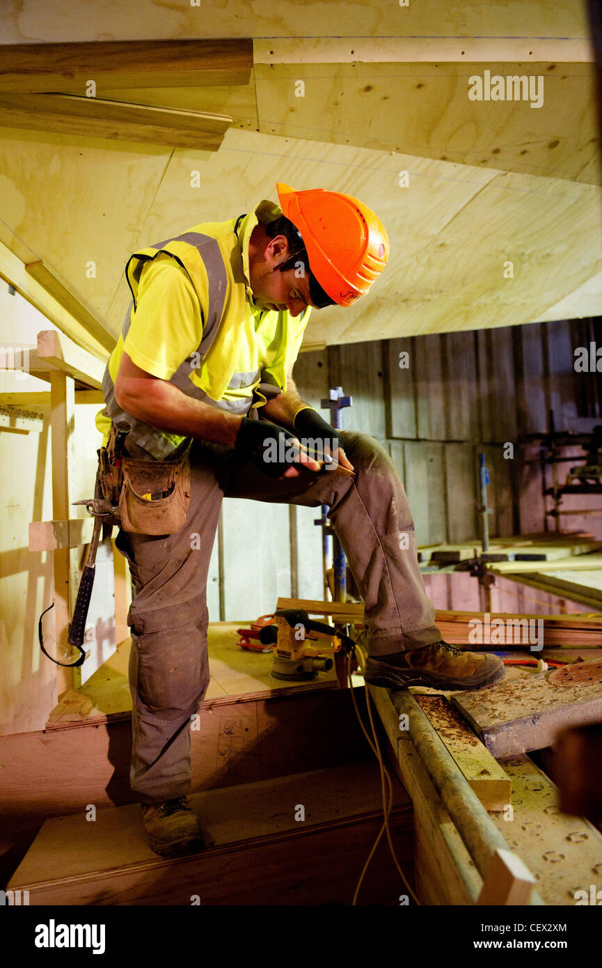 Carpenters working on a building Stock Photo - Alamy