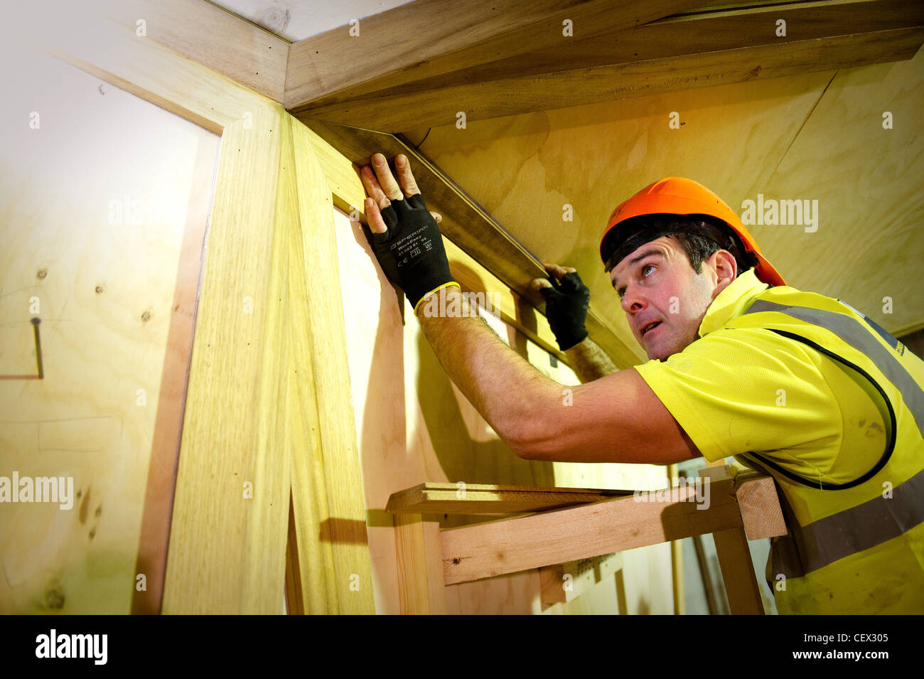 Carpenters working on a building Stock Photo - Alamy