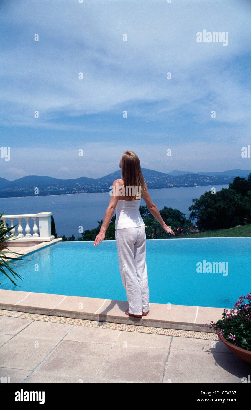 Standing with arms by sides hi-res stock photography and images - Alamy