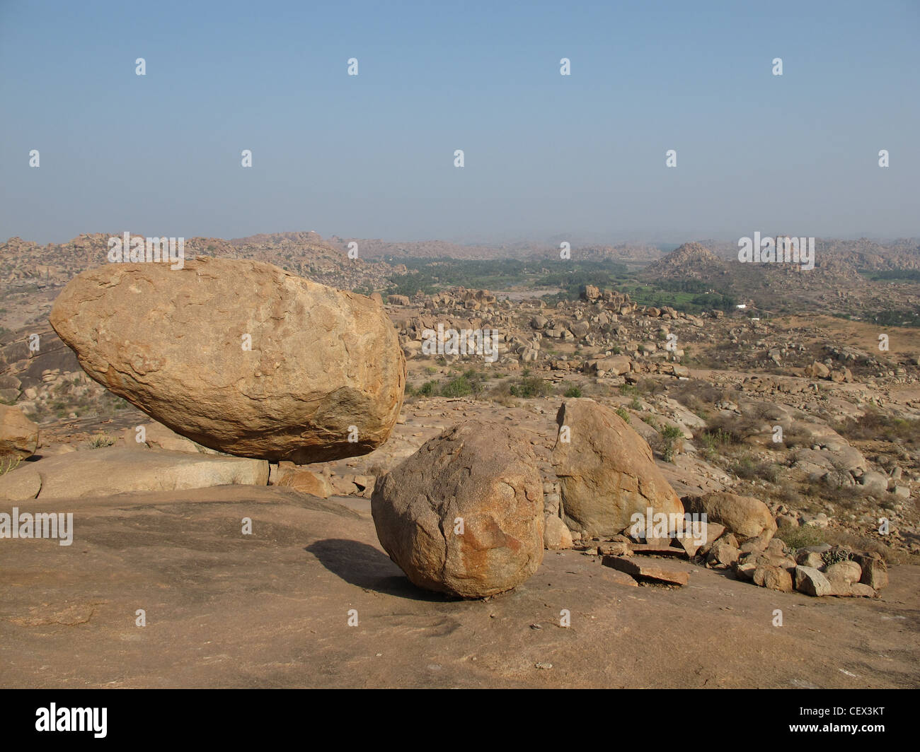 Balancing granite boulder Stock Photo - Alamy