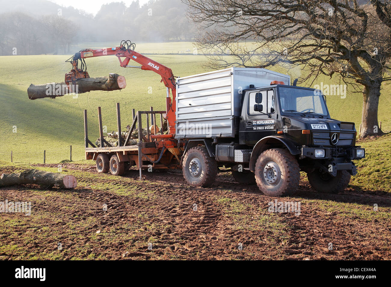 Farmer mercedes unimog loading up hi-res stock photography and images ...