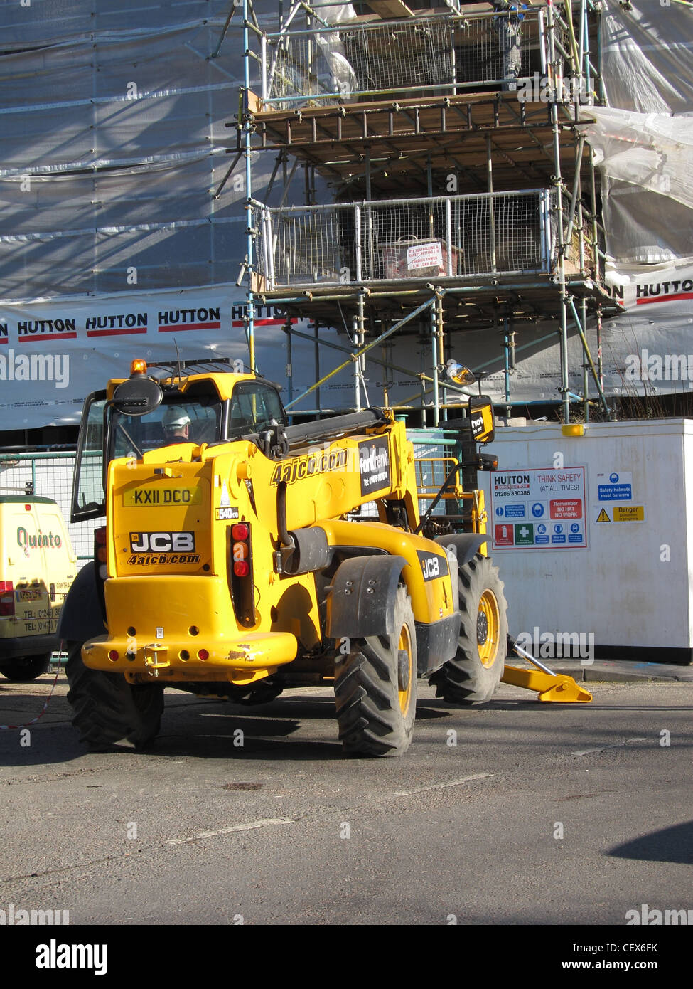 Yellow JCB at Building site Stock Photo - Alamy