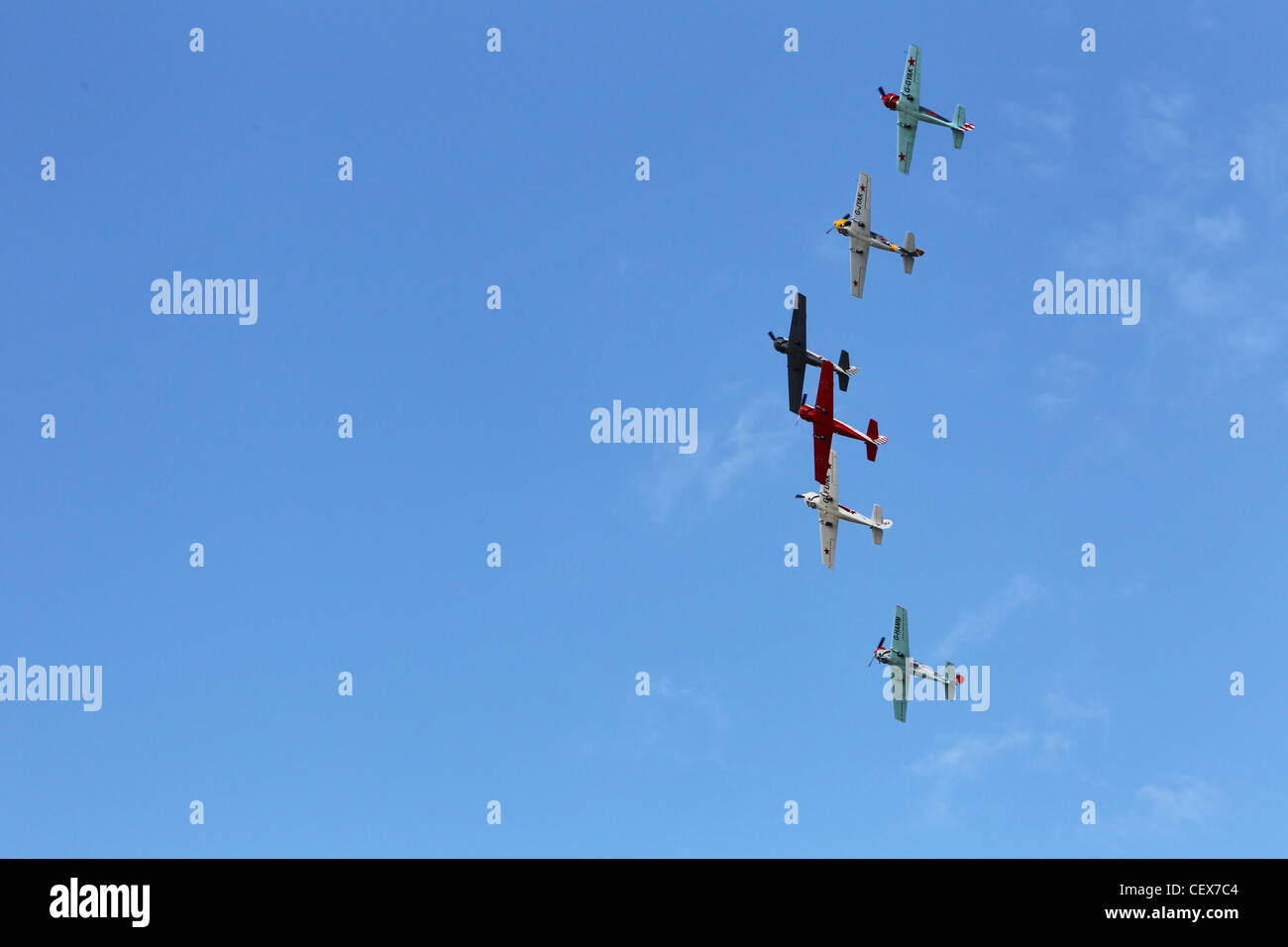 airplanes perform aerobatic stunts against the sky Stock Photo - Alamy