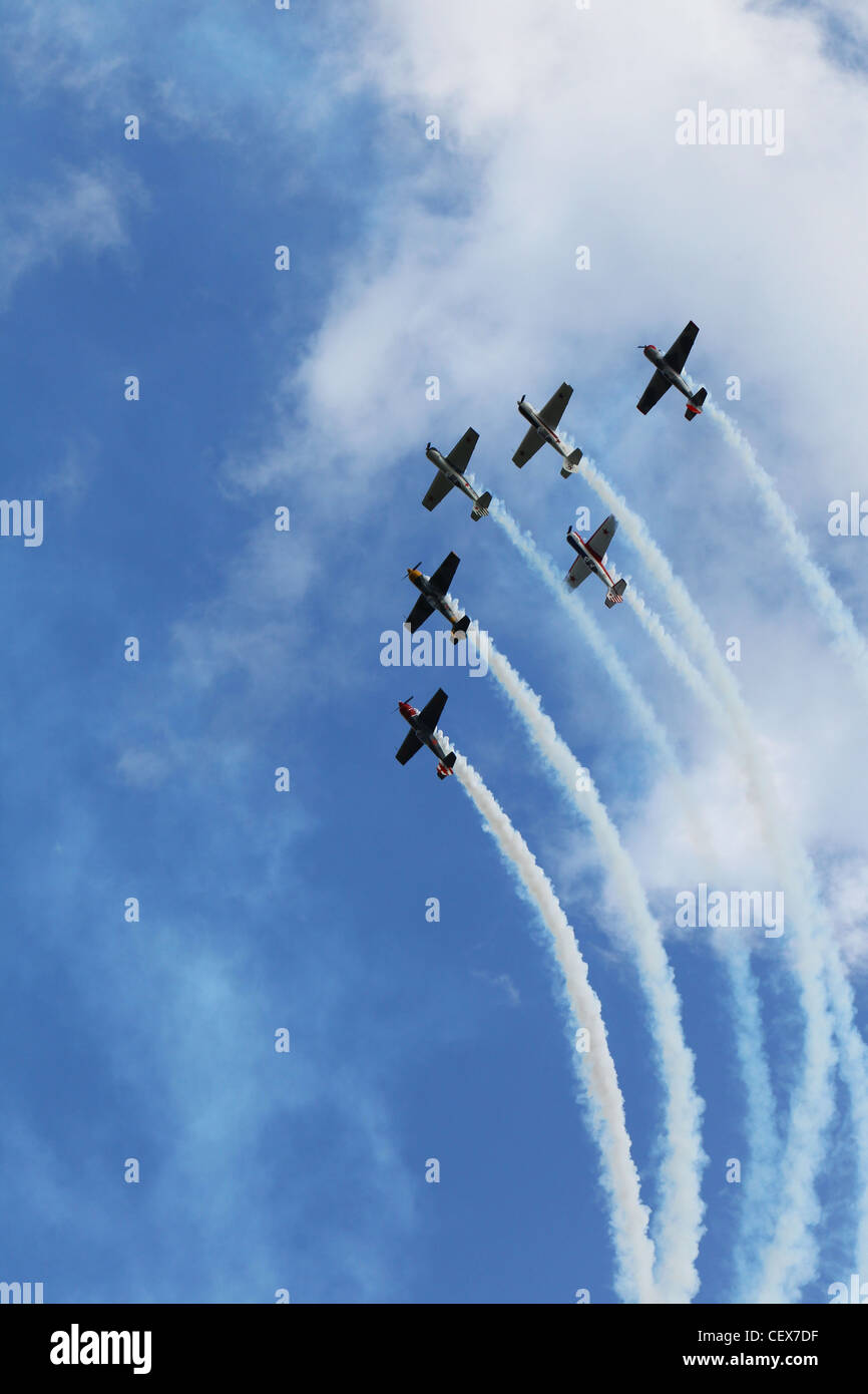 airplanes perform aerobatic stunts against the sky Stock Photo - Alamy