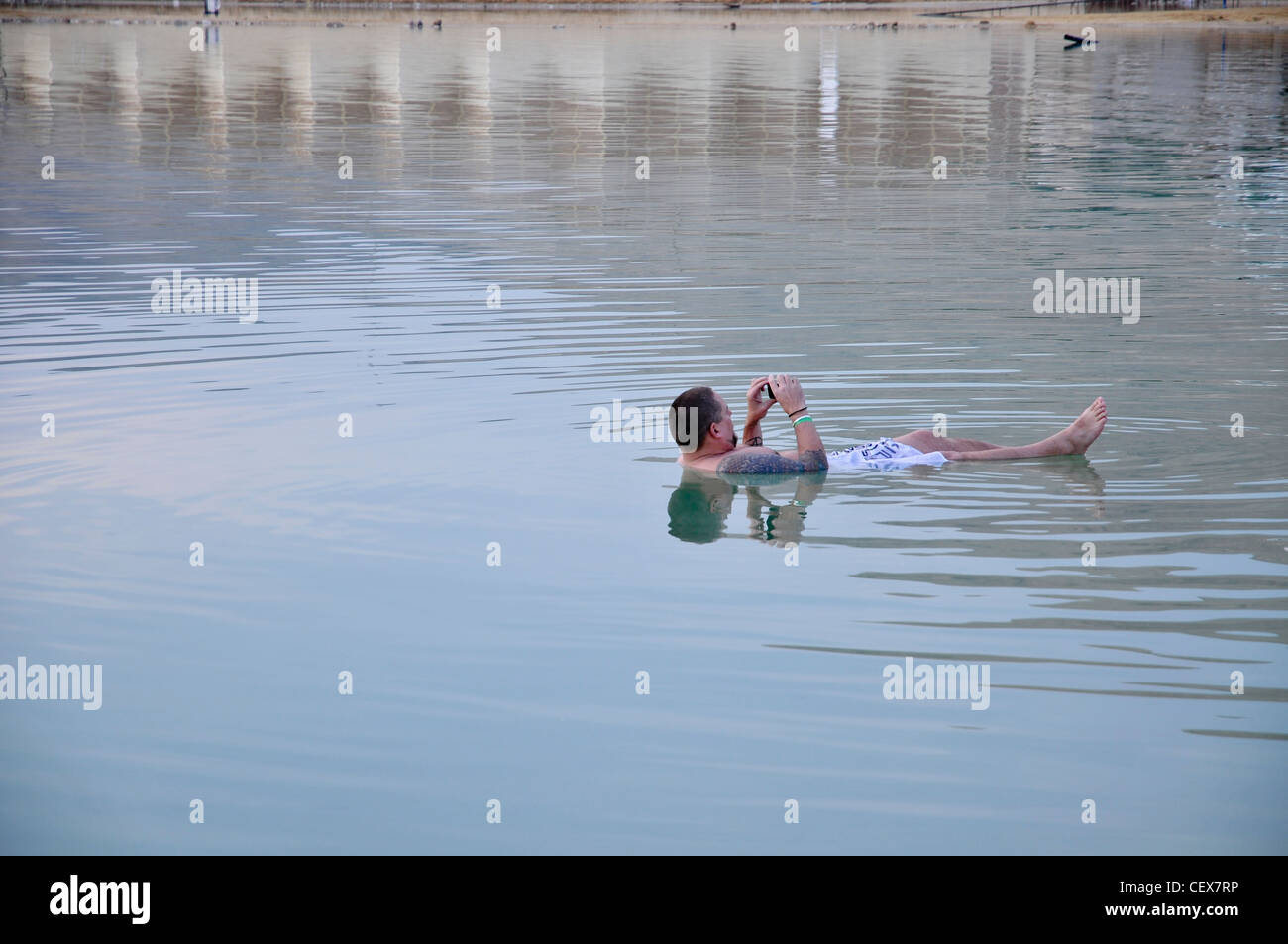 Israel, Dead Sea tourists floating in the water Stock Photo - Alamy