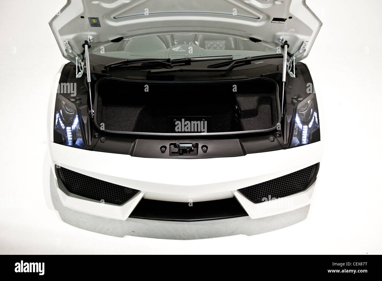 White Lamborghini convertible with open boot Stock Photo - Alamy