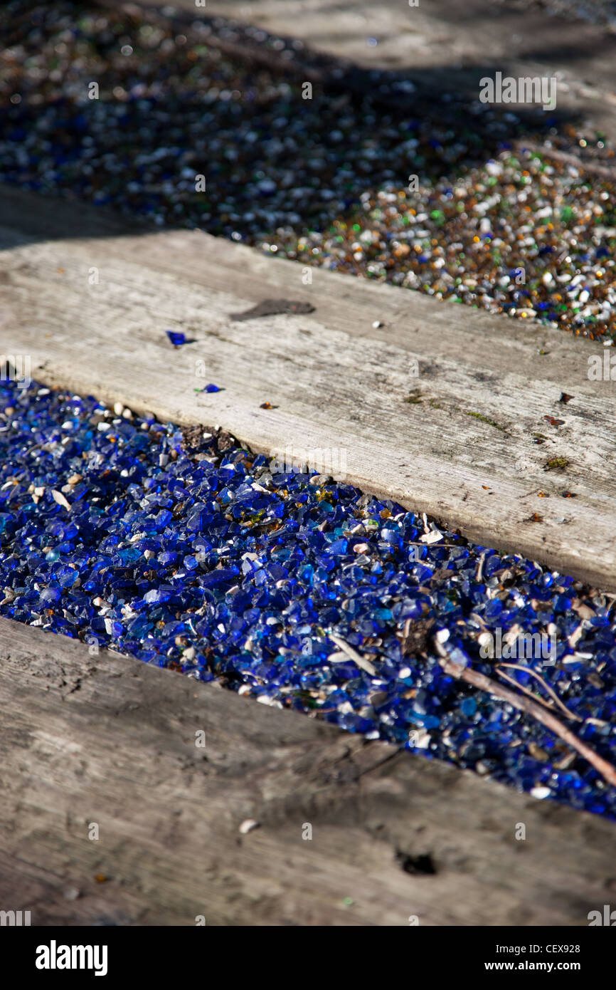 Ground coloured glass acts as mulch in a drought tolerant garden ...