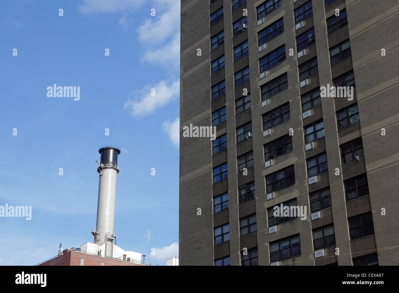 Brick industrial building with balconies and tower hi-res stock ...