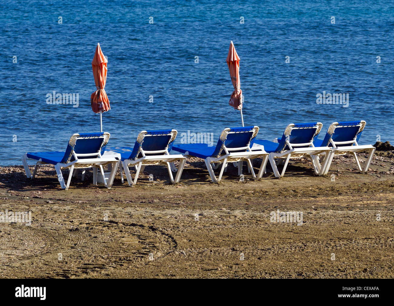 Five deck chairs hi-res stock photography and images - Alamy