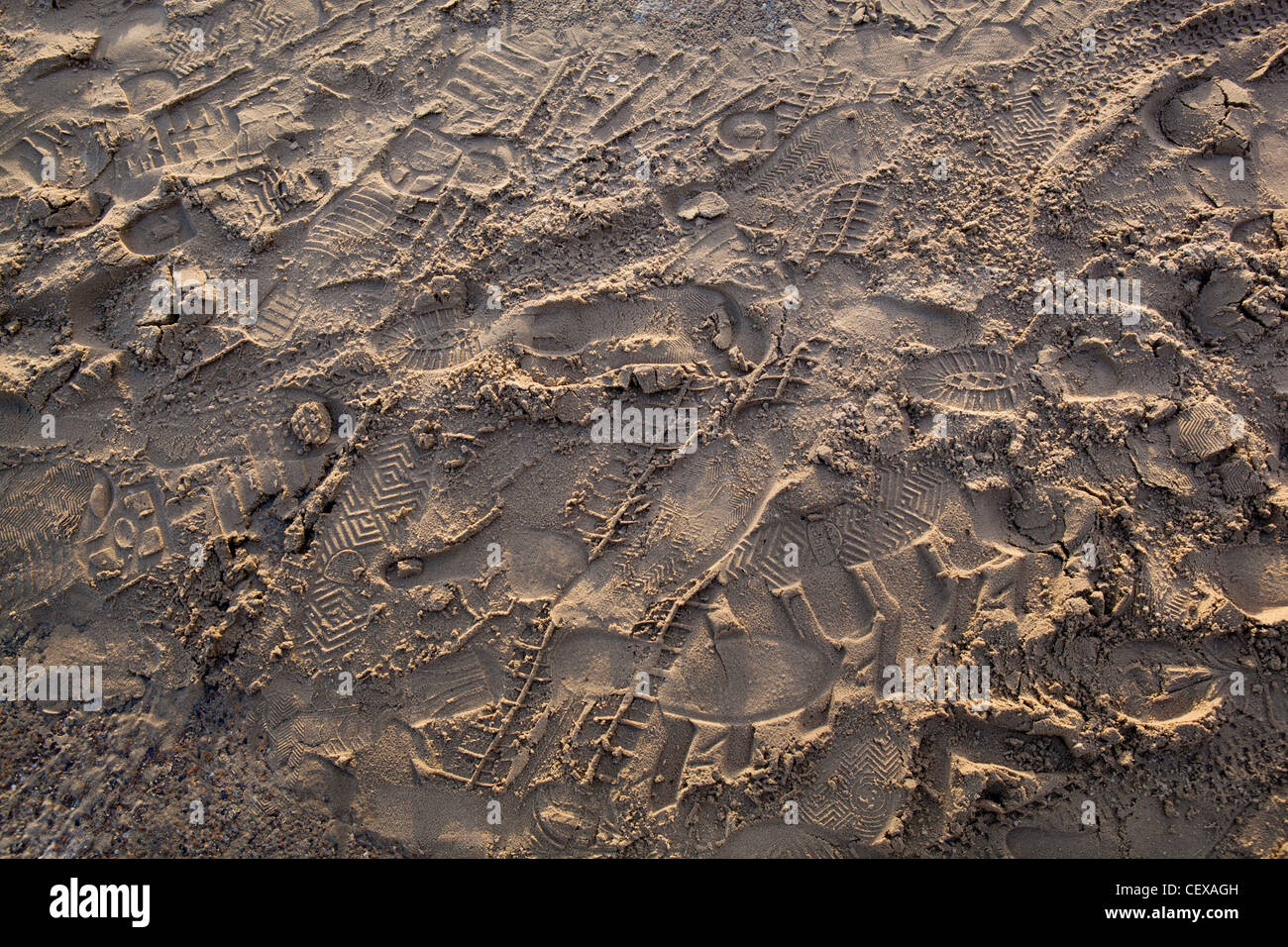 Footprints in sand with texture Stock Photo - Alamy